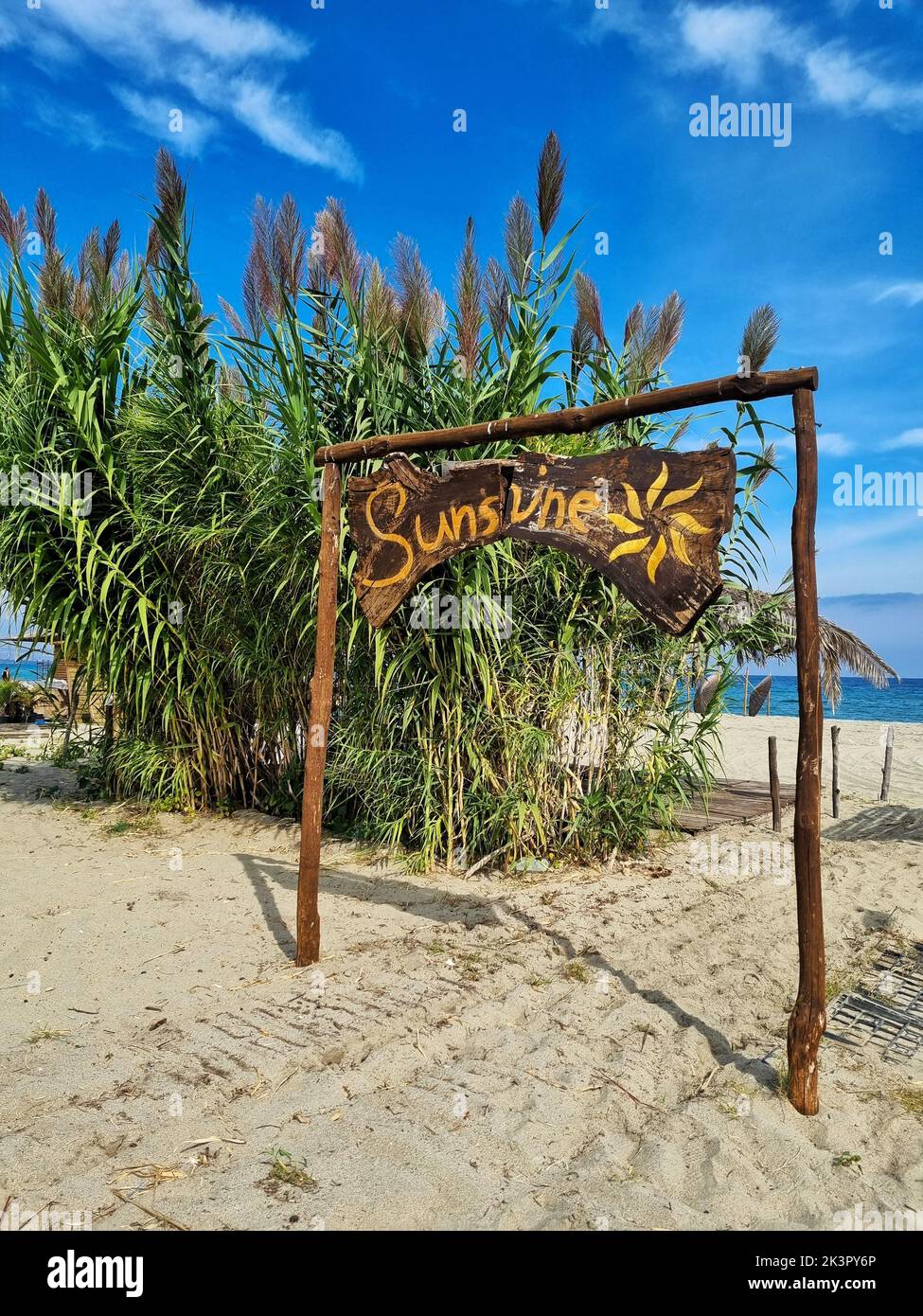 An entrance sign Sunshine leading to the beach in Greece Stock Photo ...