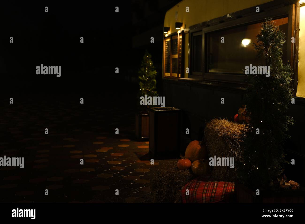 Halloween background with texture orange pumpkins on dark strow stack ...