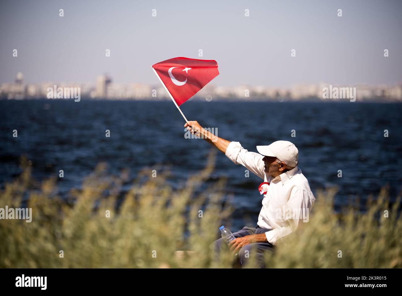 Izmir, Turkey - September 9, 2022: Senior man with a Turkish flag on ...