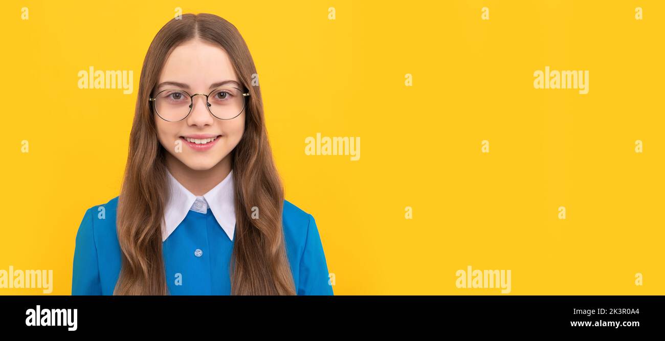 Tween girl. Happy girl child in eyeglasses yellow background. Girls ...