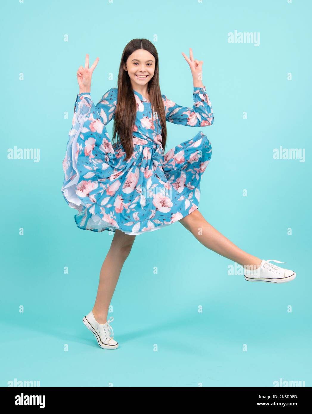 Happy teenager, positive and smiling emotions. Full size length of ...