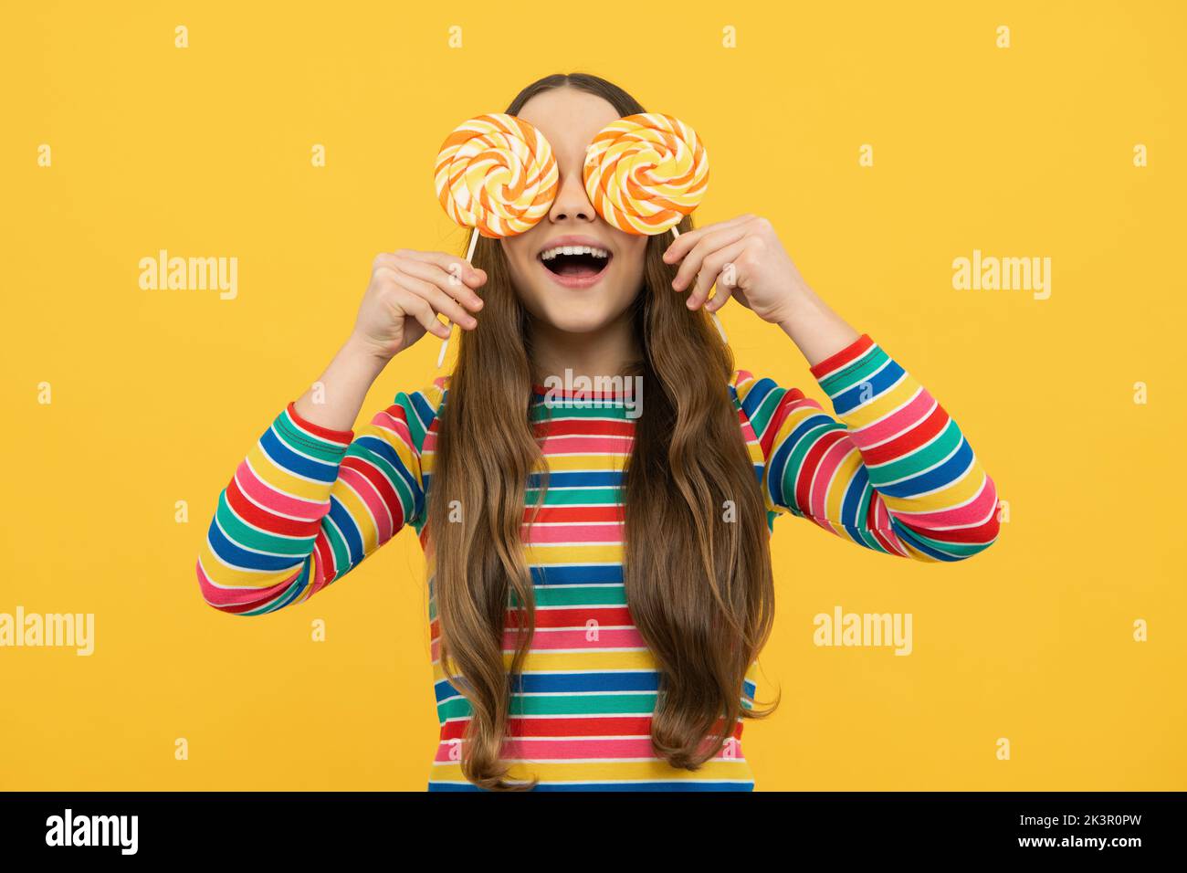 Teenage girl with candy lollipop, happy child 12, 13, 14 years old ...