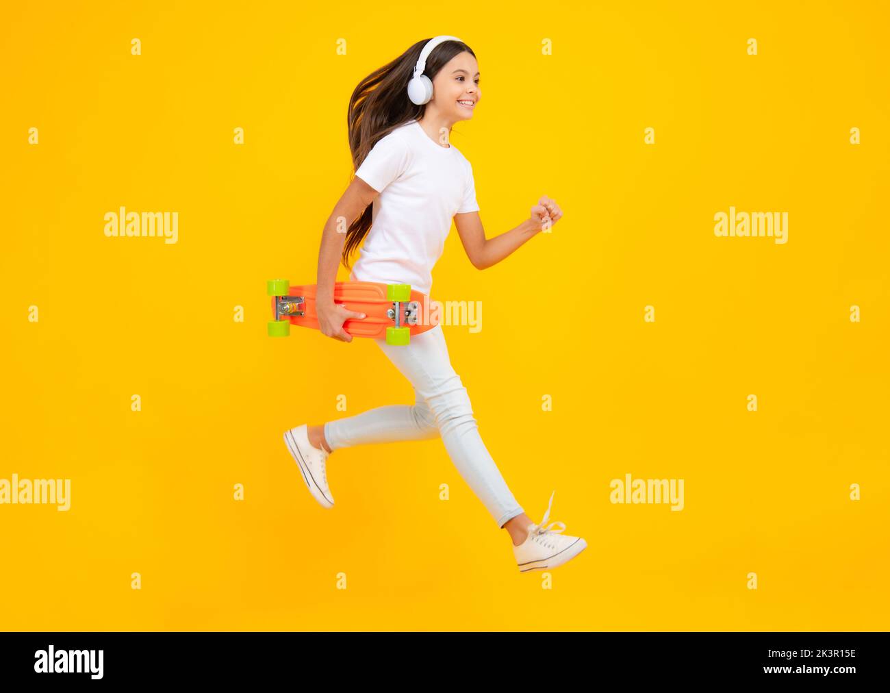 Happy teenager portrait. Jump and run. Fashion teenage lifestyle ...