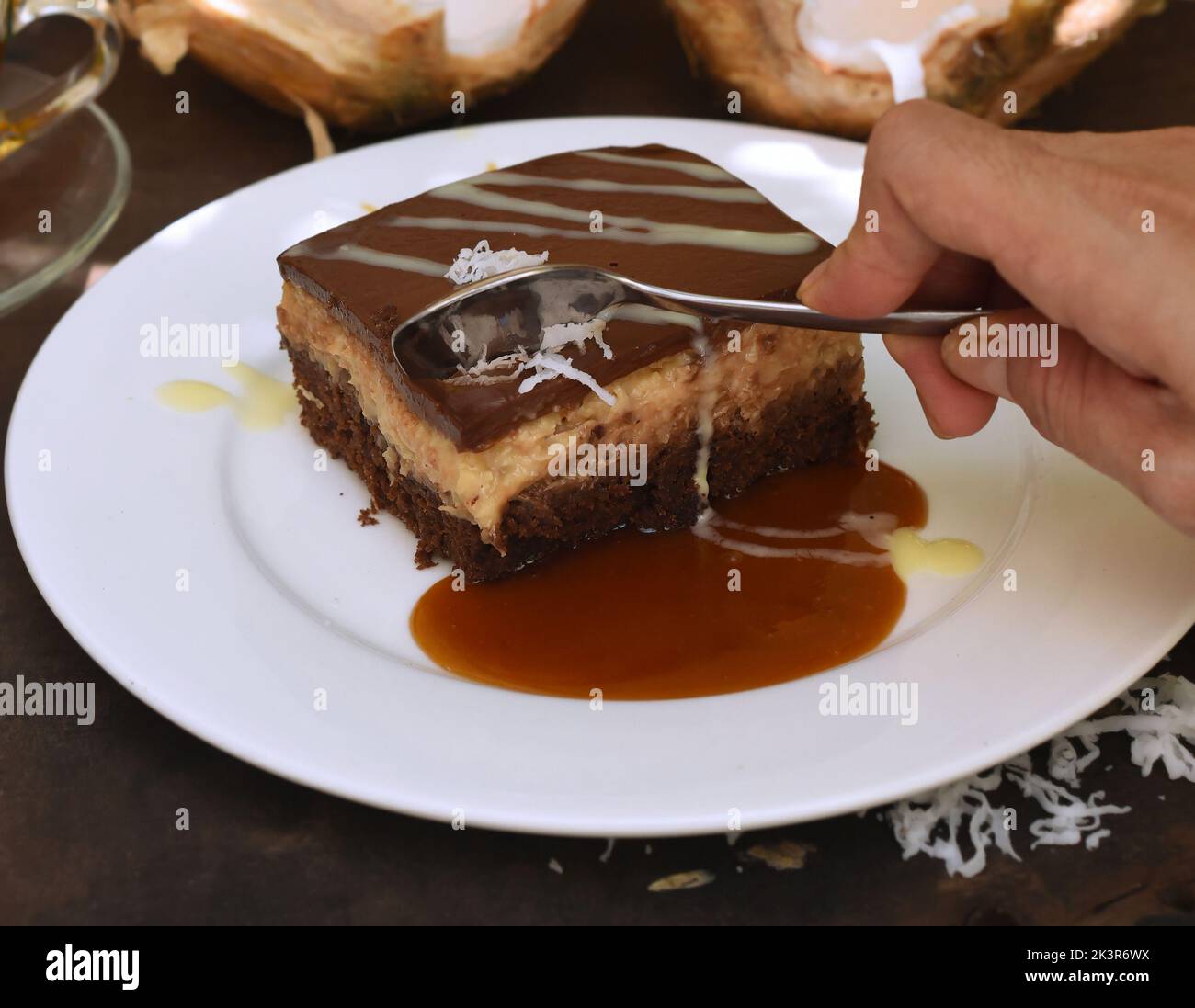 Hand with spoon hi-res stock photography and images - Alamy