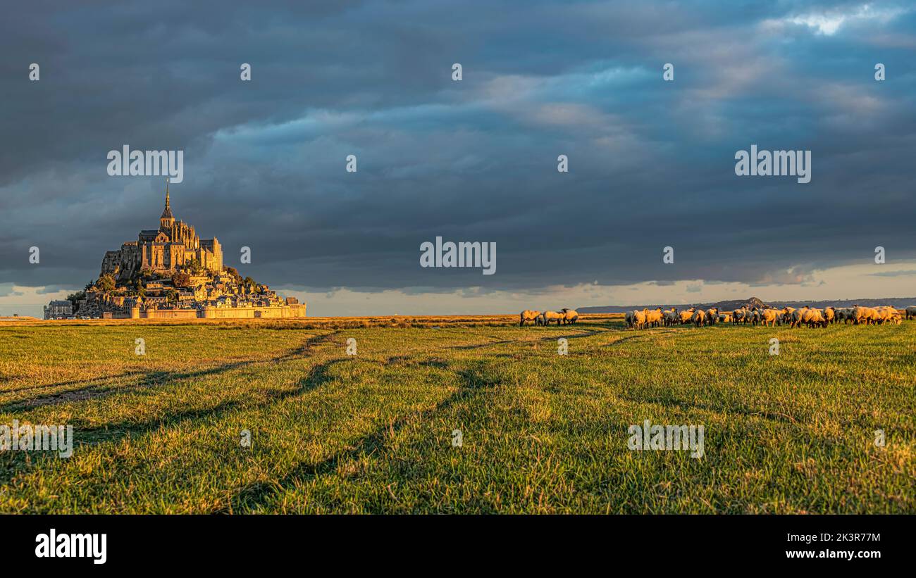 Breathtaking sunrise at the famous Le Mont Saint-Michel tidal island ...