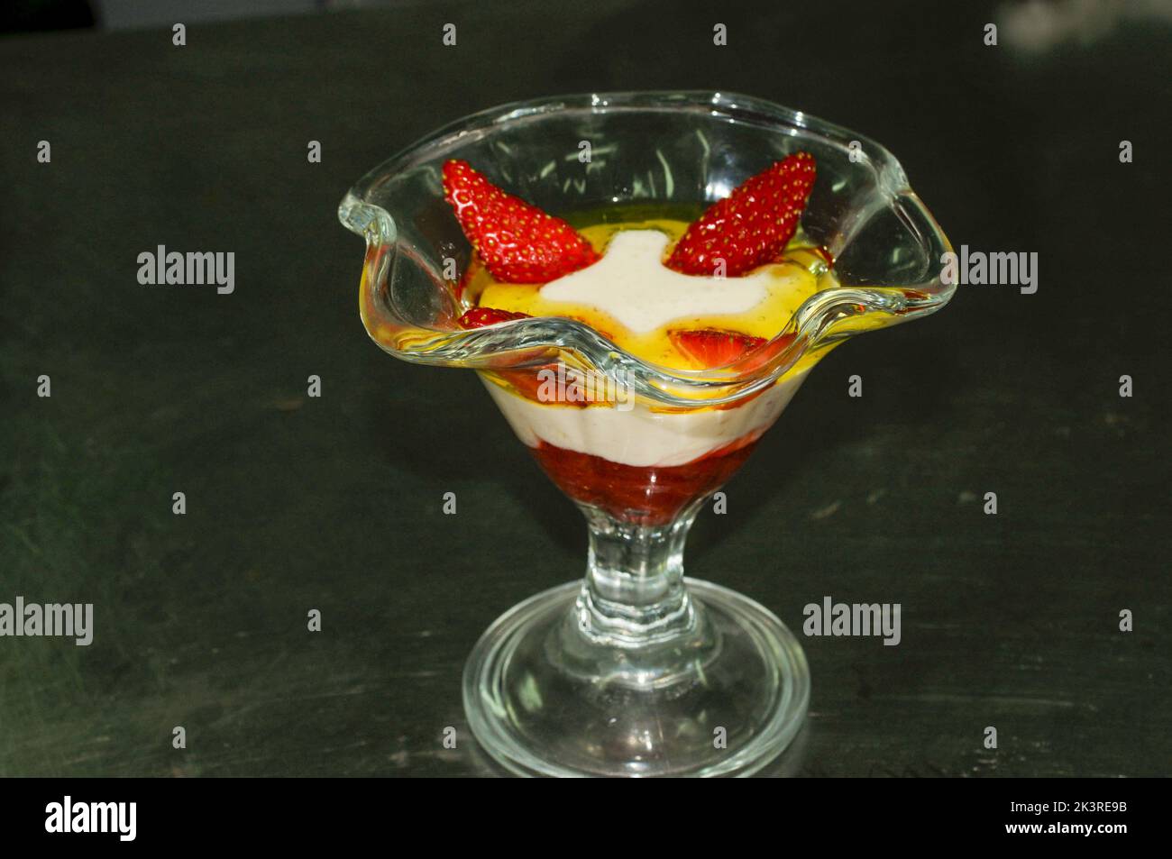 Three layer cocktail isolated on dark metallic background Stock Photo ...
