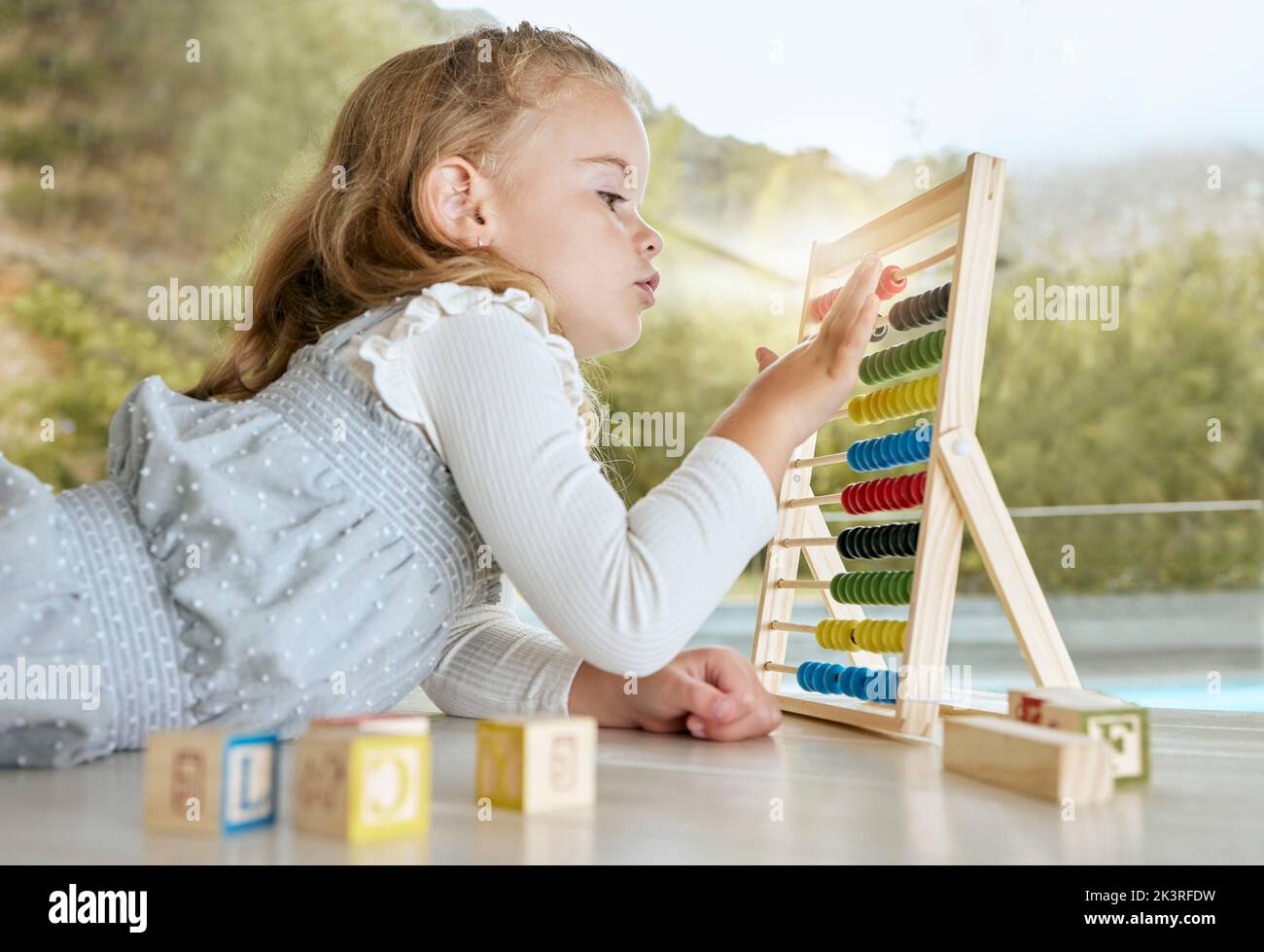Education, abacus and girl learning math with a color tool while ...