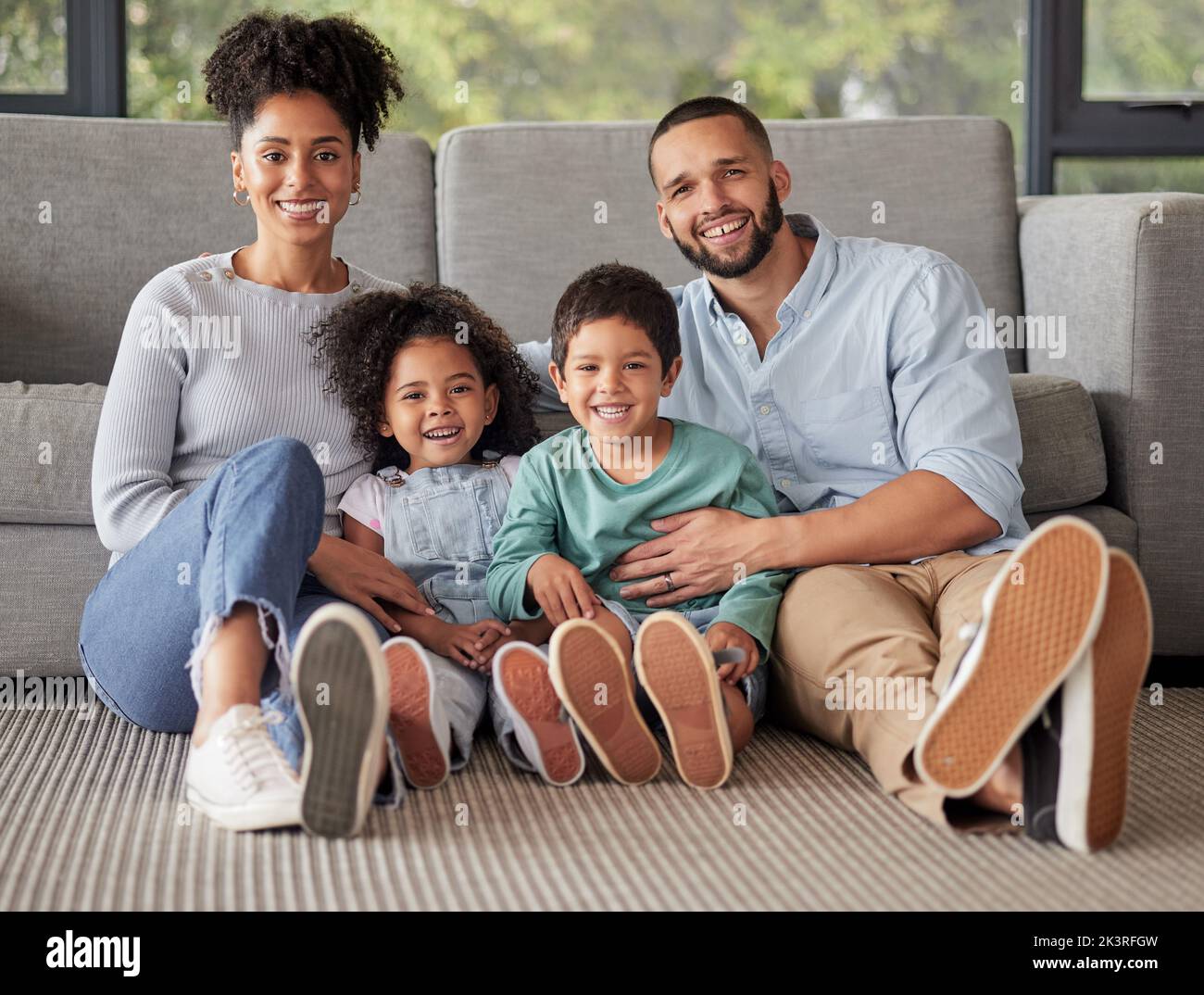 Happy family, portrait and bonding on a living room floor, smile and ...