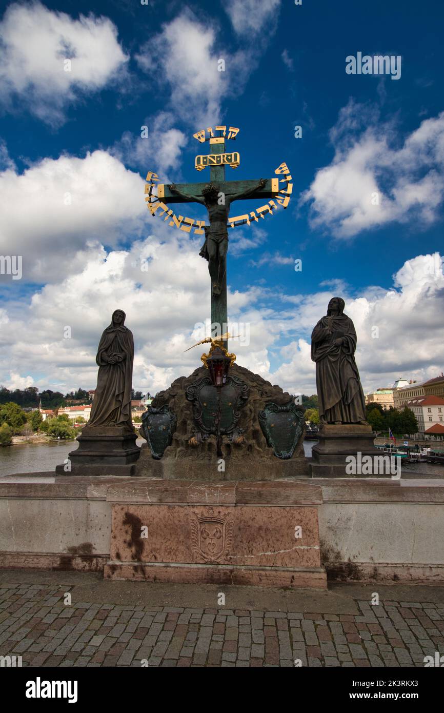 Statuary of the Holy Crucifix and Calvary on Charles bridge. Prague ...
