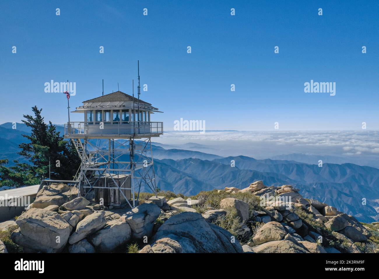 A historic fire lookout tower watches over the California mountains for ...