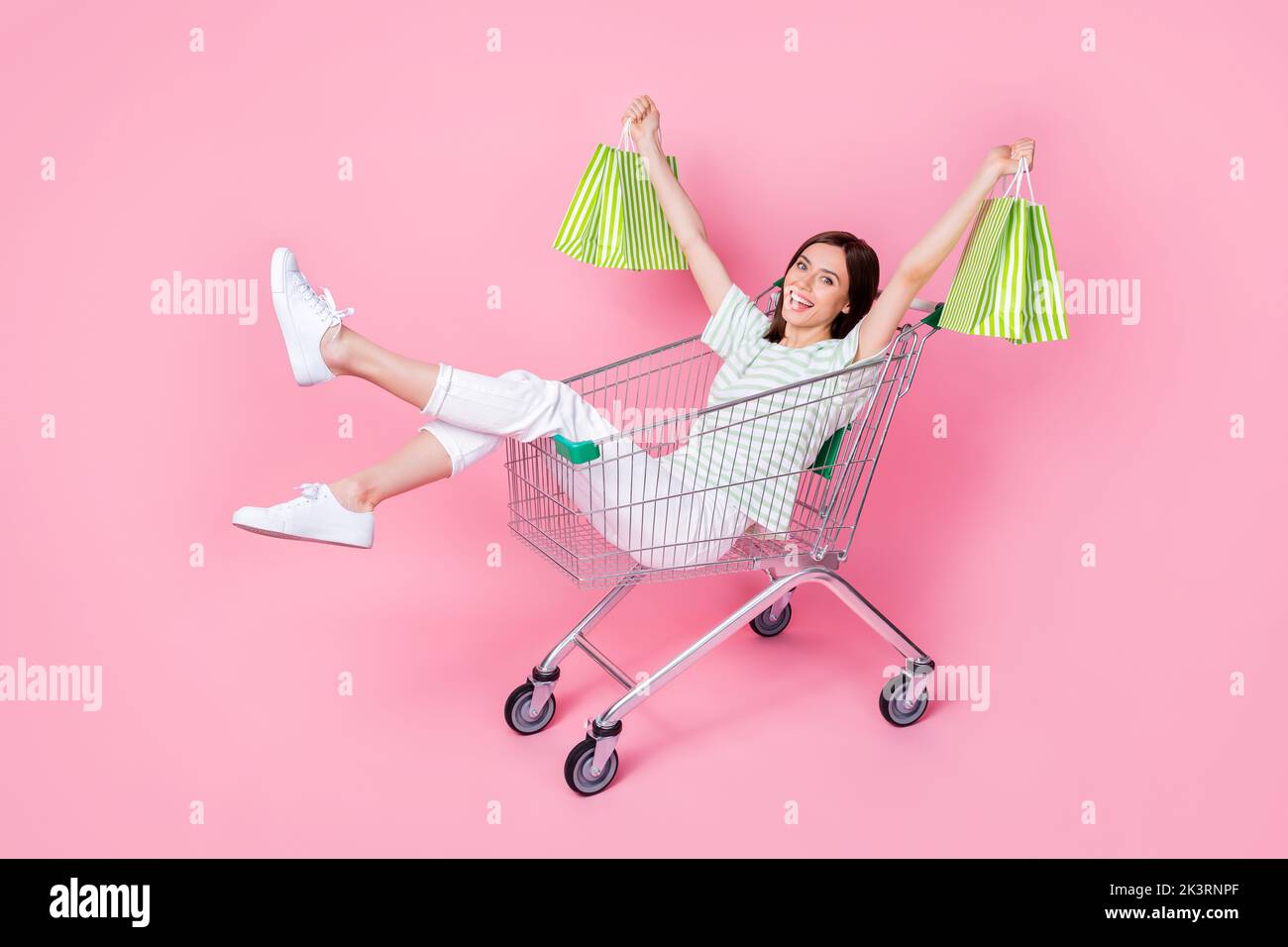 Full length photo of overjoyed lady stylish trendy outfit sit trolley ...