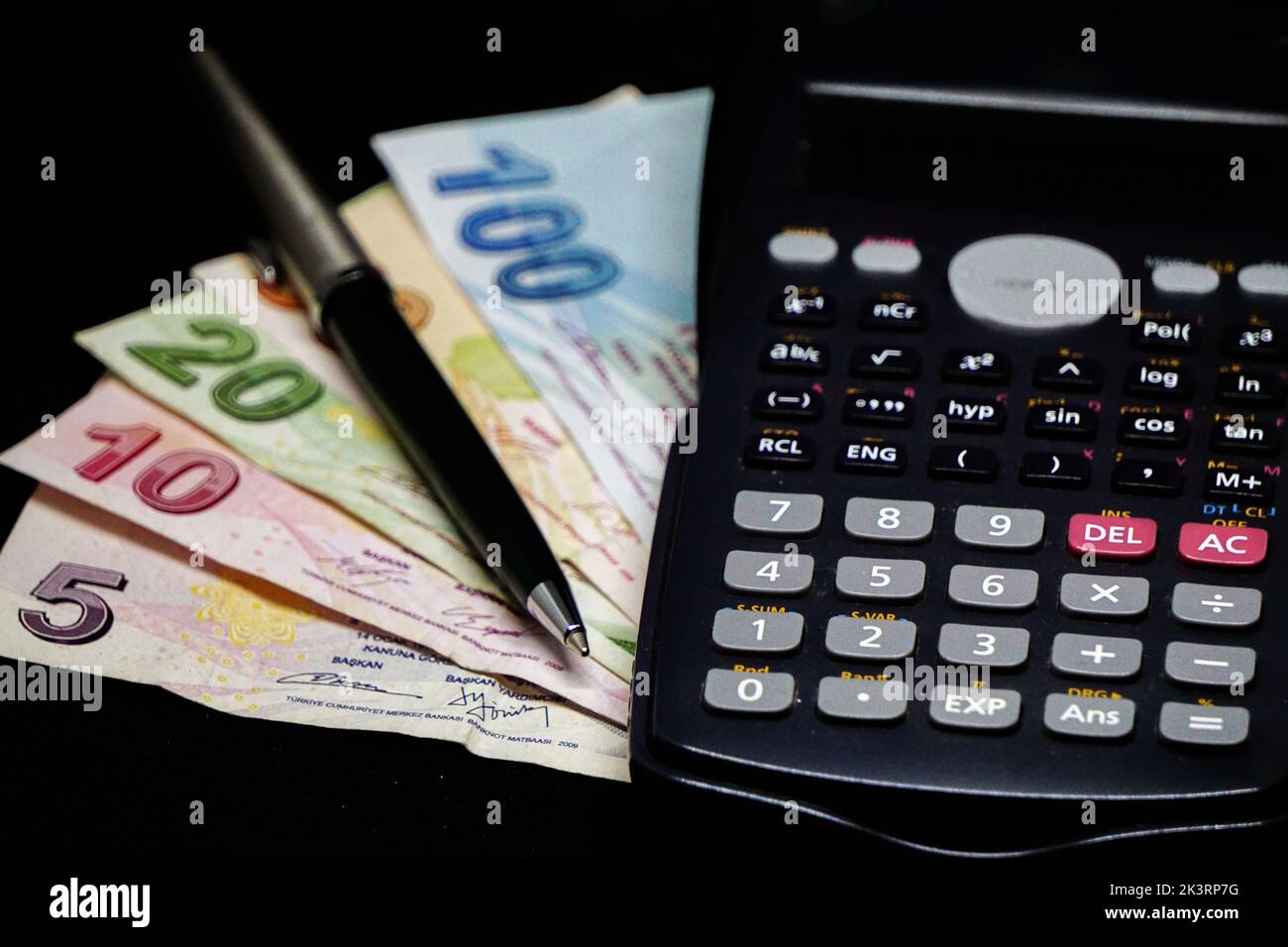 The Turkish lira banknotes and a calculator for calculating the bills ...