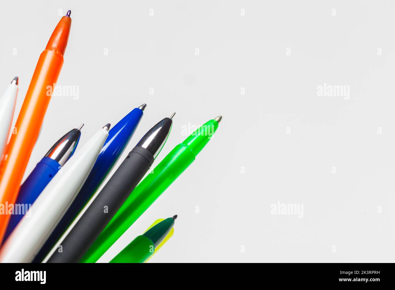 different colors pens isolated on the white background Stock Photo - Alamy