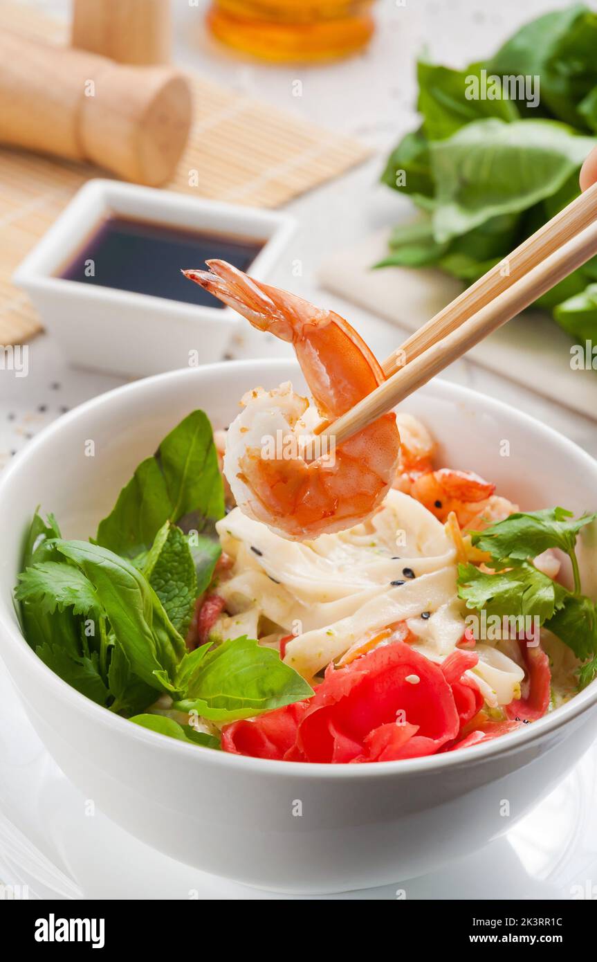 wheat noodles with shrimp. Asian cuisine Stock Photo - Alamy