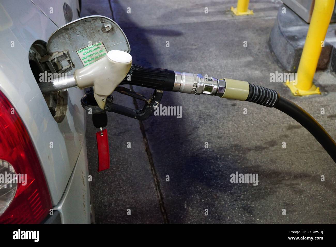 The process of filling up a car at the gas station Stock Photo - Alamy