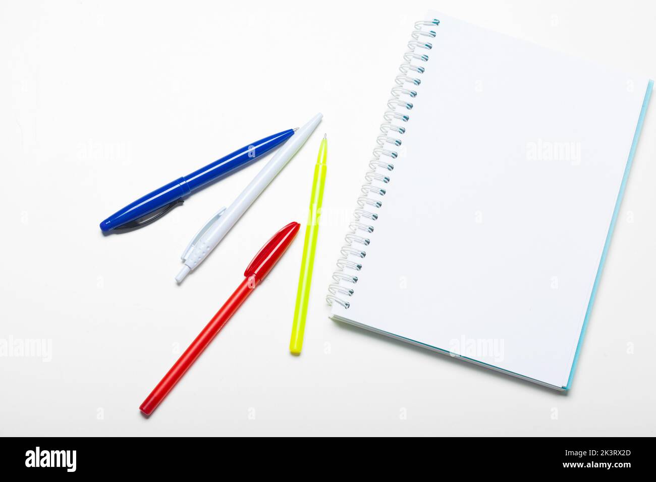 notepad notebook and ball pont pen isolated on white background Stock ...