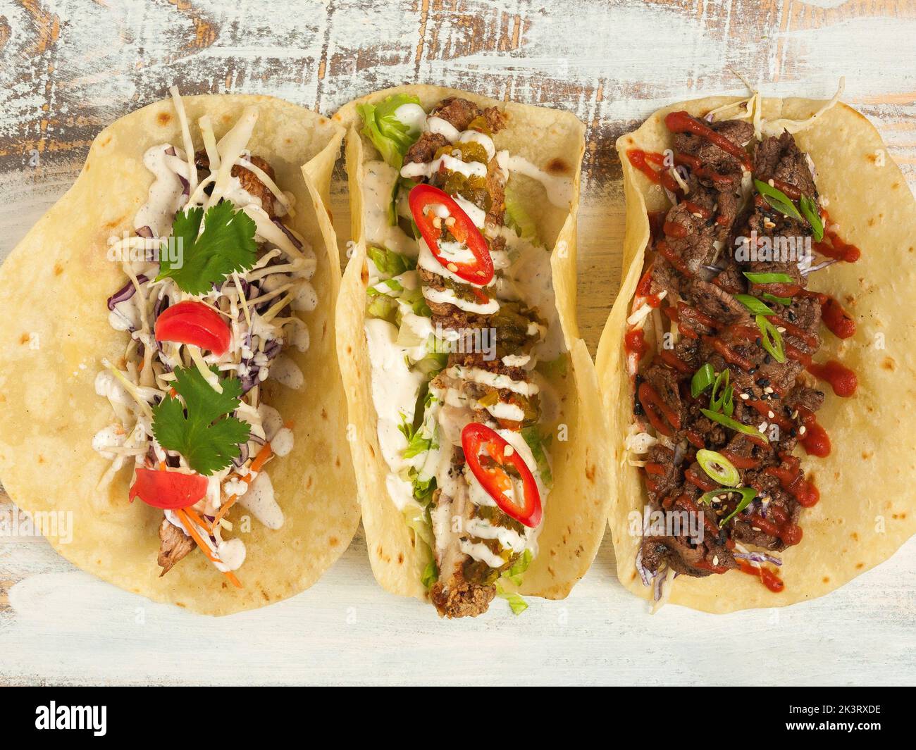 assorted mexican tacos: chicken, beef and pork with vegetables Stock ...