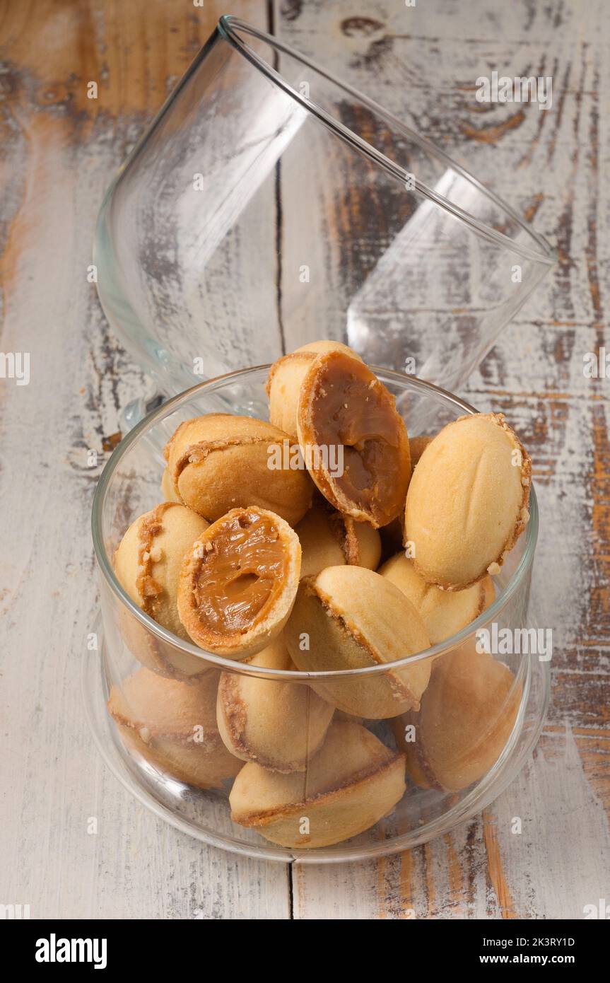 sweet nuts with boiled condensed milk in a glass Cup Stock Photo - Alamy