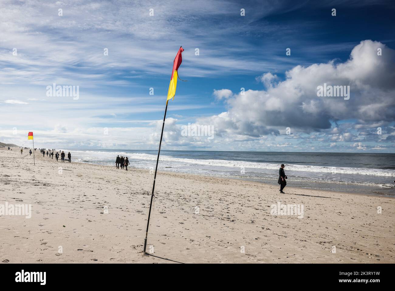 28 September 2022, Schleswig-Holstein, Westerland/Sylt: Walkers go for ...