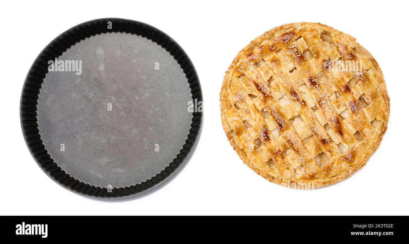 Round baked apple pie and non-stick baking sheet, white isolated ...