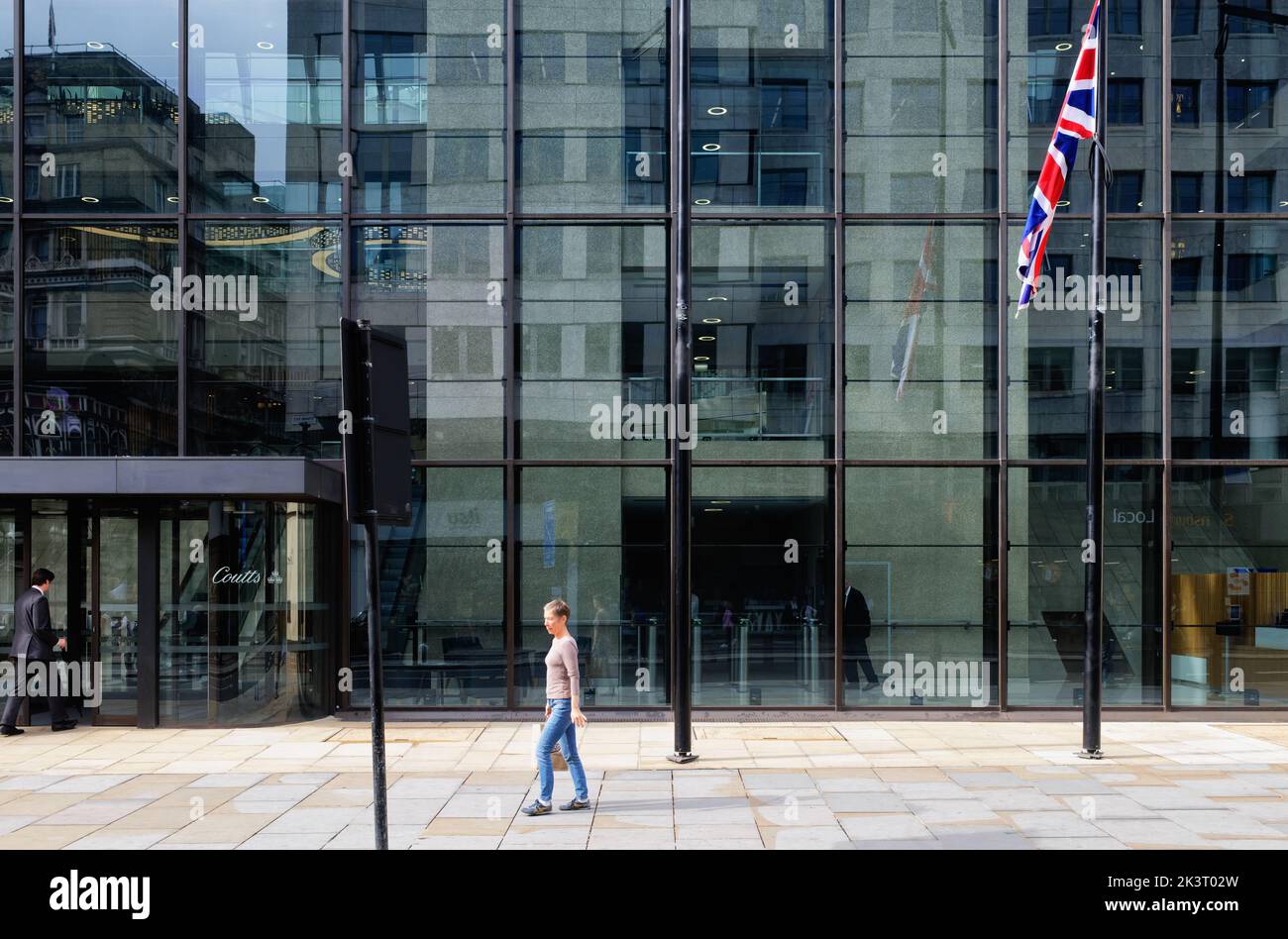 THe British flag, the Union Jack, at half-mast outside Coutts * Co bank ...