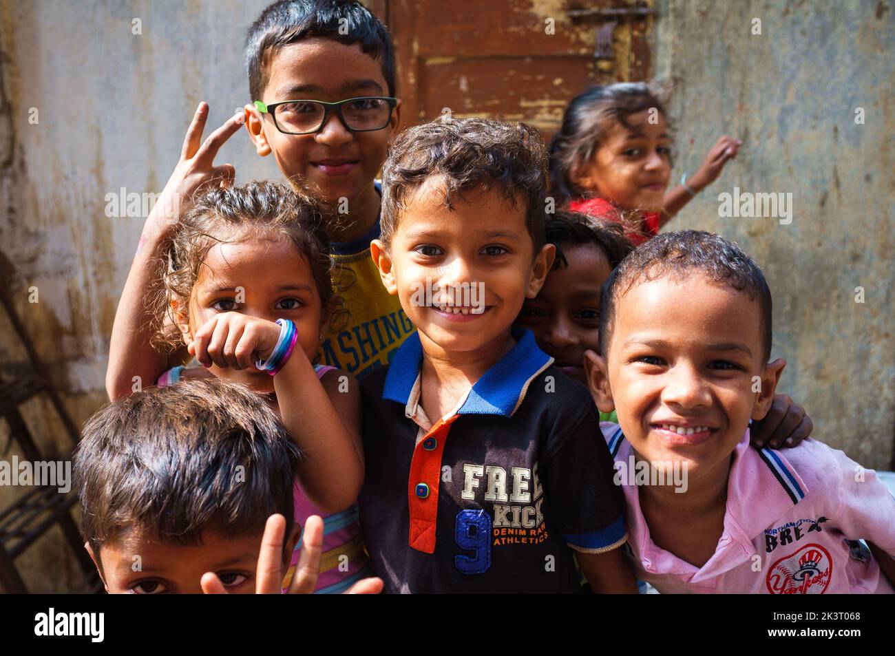 A closeup of happy smiling poor children from Banganga slum in Mumbai ...