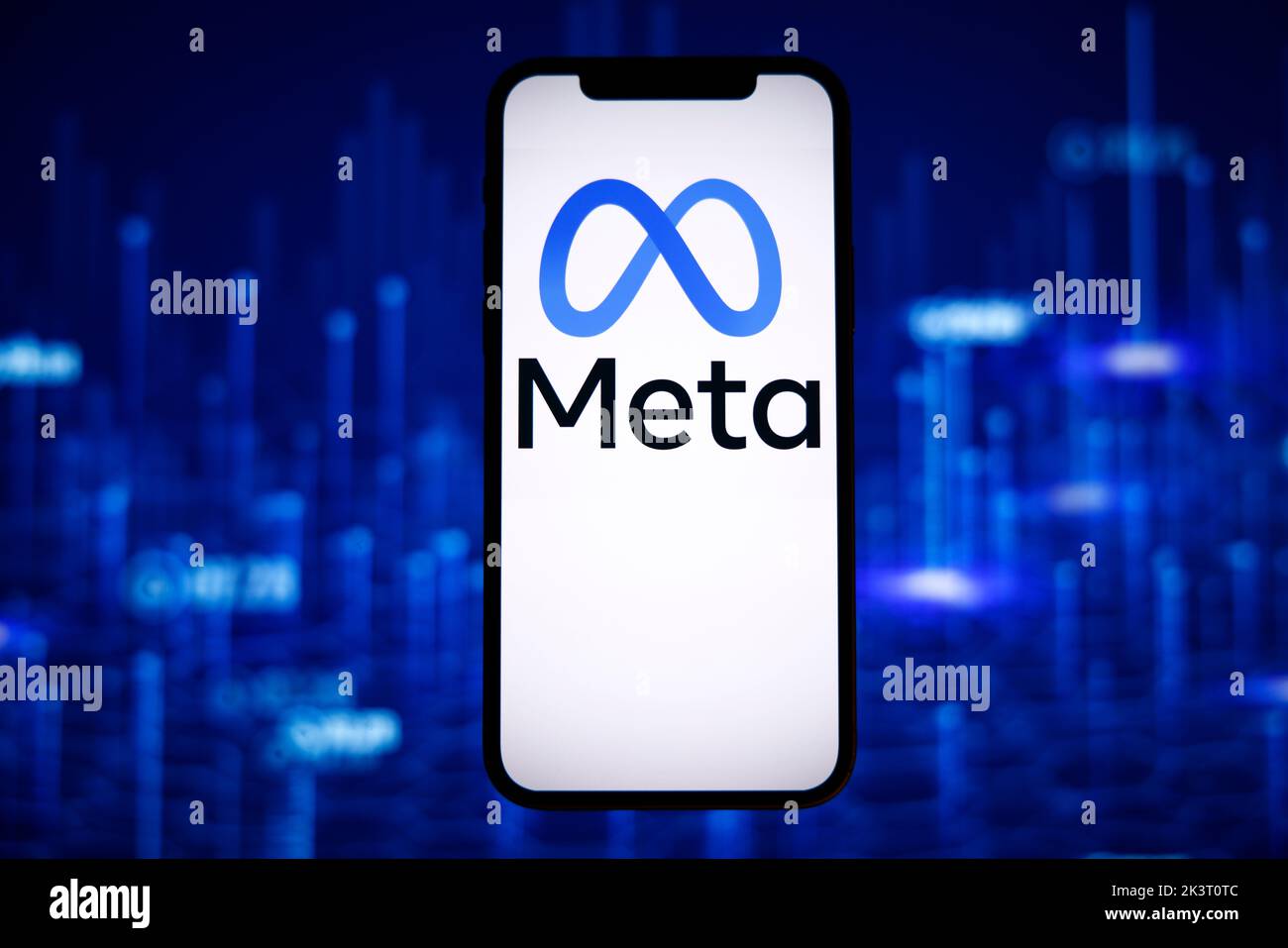 The Meta logo is seen on a mobile phone in this photo illustration in ...