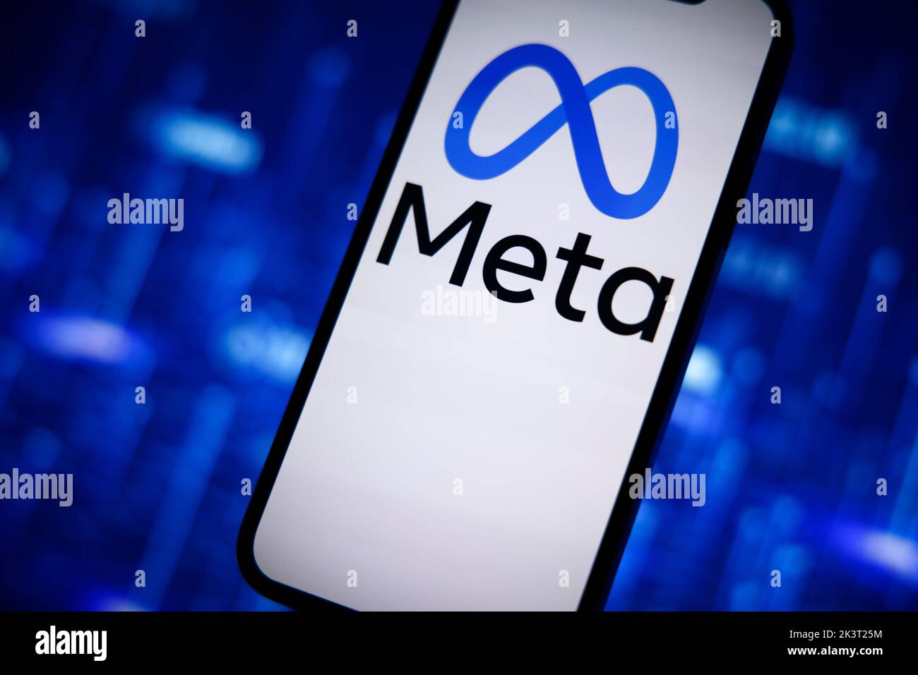 The Meta logo is seen on a mobile phone in this photo illustration in ...