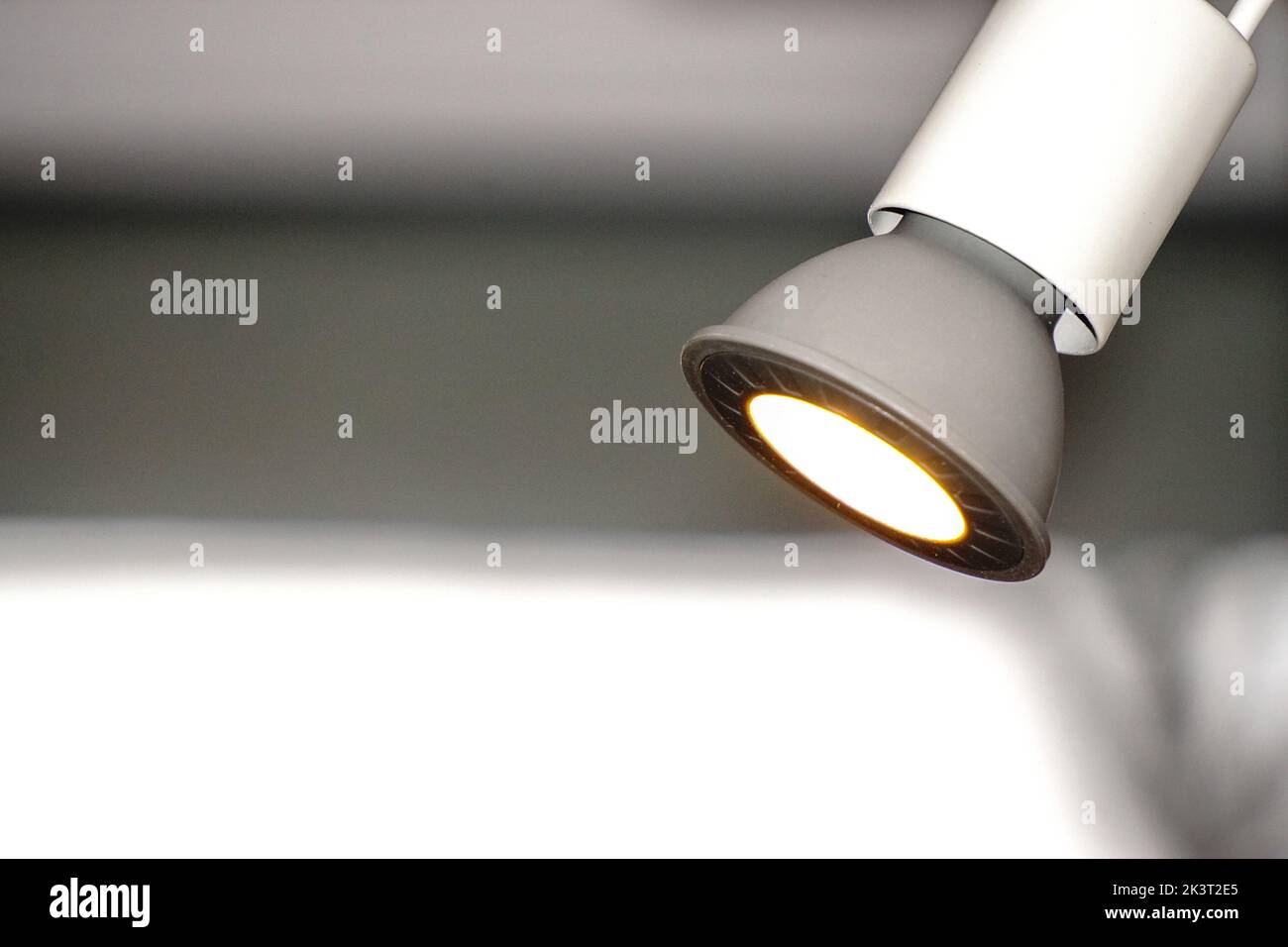 Grey and white background on led spot light close up Stock Photo - Alamy