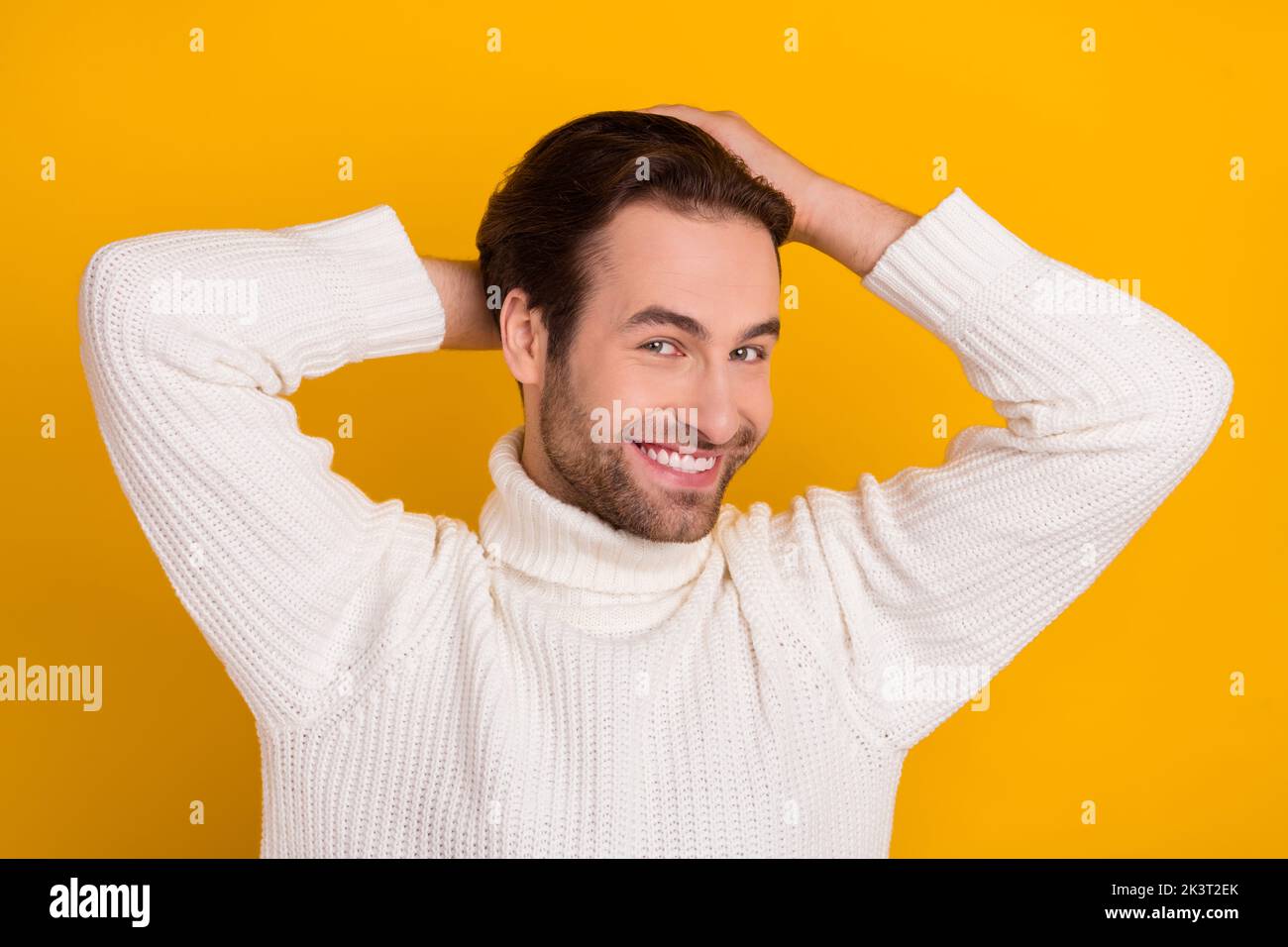 Photo of attractive cute guy wear white pullover arms head washing hair ...