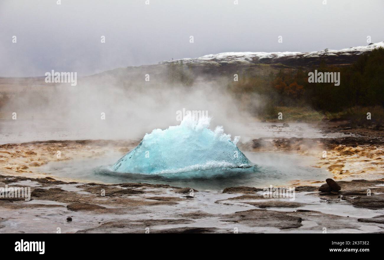 Strokkur geyser blue water explosion in Iceland Stock Photo - Alamy