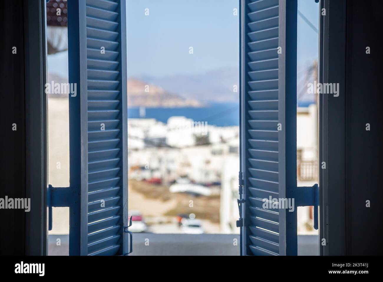 Naxos island, Cyclades Greece. View from the open wooden shutters ...