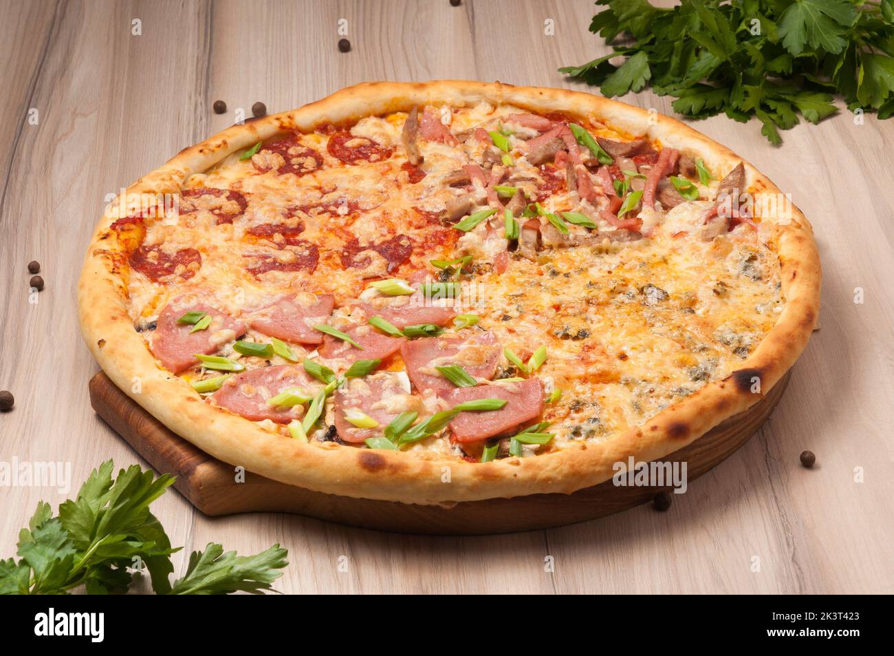 tasty assorted pizza with different fillings cheeses, ham, pepperoni ...