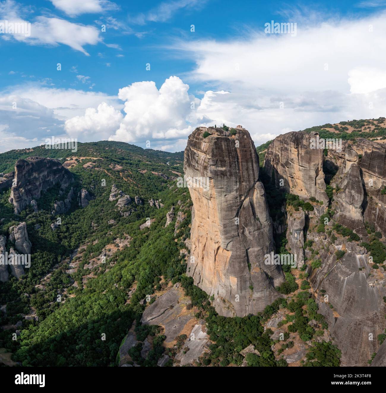 Meteora Greece. Blue sky with clouds over Monastery buildings on top of ...