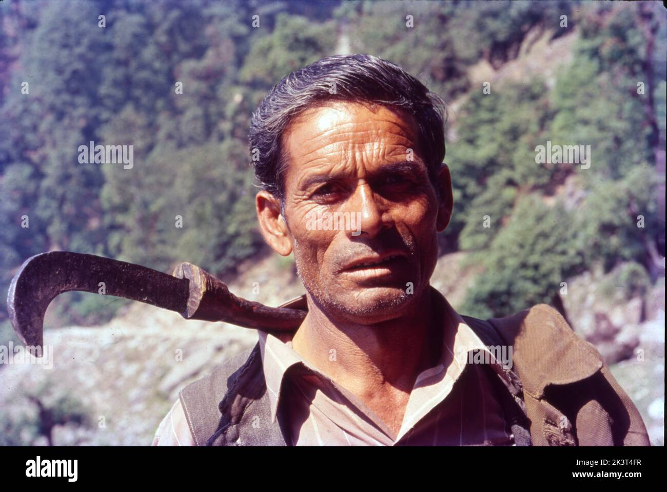 Man carrying a sickle hi-res stock photography and images - Alamy