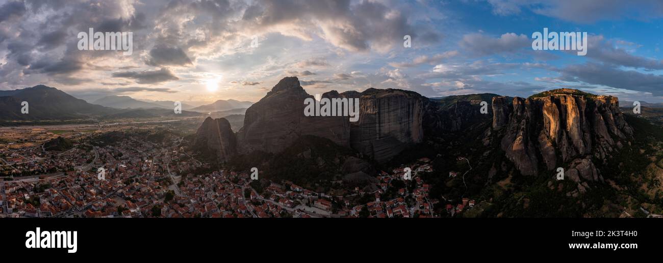 Meteora Greece panorama. Sunset and cloudy sky over Kalabaka town and ...