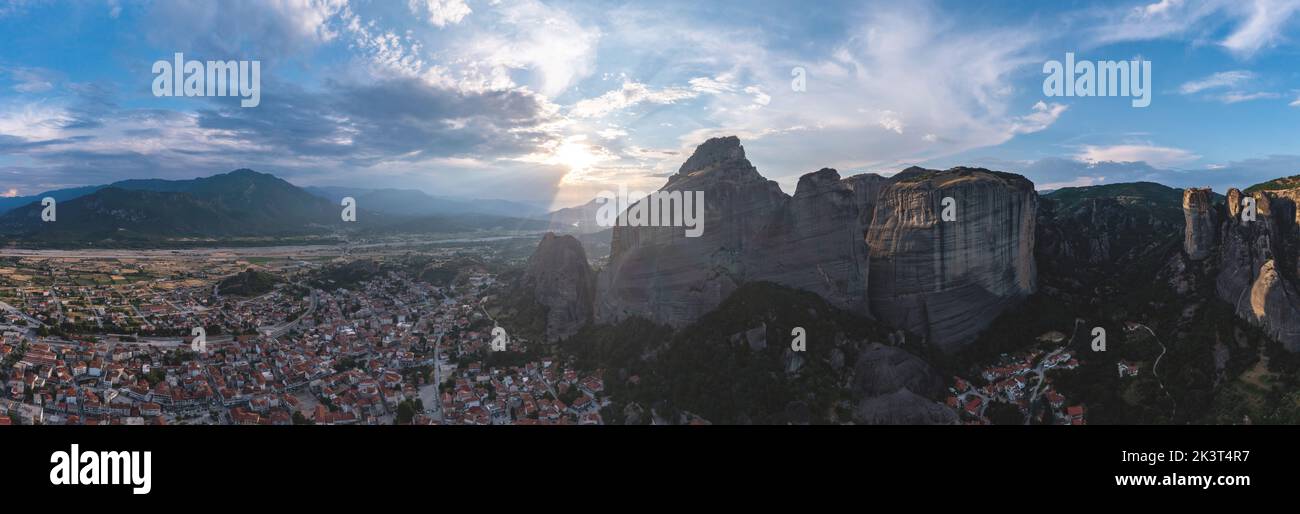 Meteora Greece landscape panorama. Sunrise and cloudy sky over Kalabaka ...