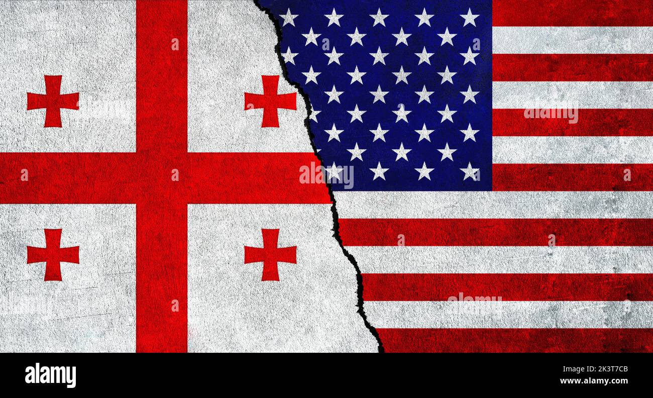 USA and Georgia flag together on a textured wall. Relations between ...