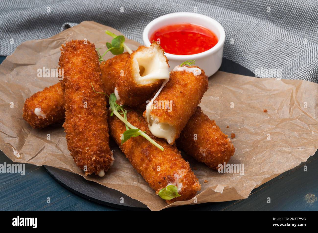 tasty cheese sticks mozzarella fries with hot chili sauce Stock Photo ...