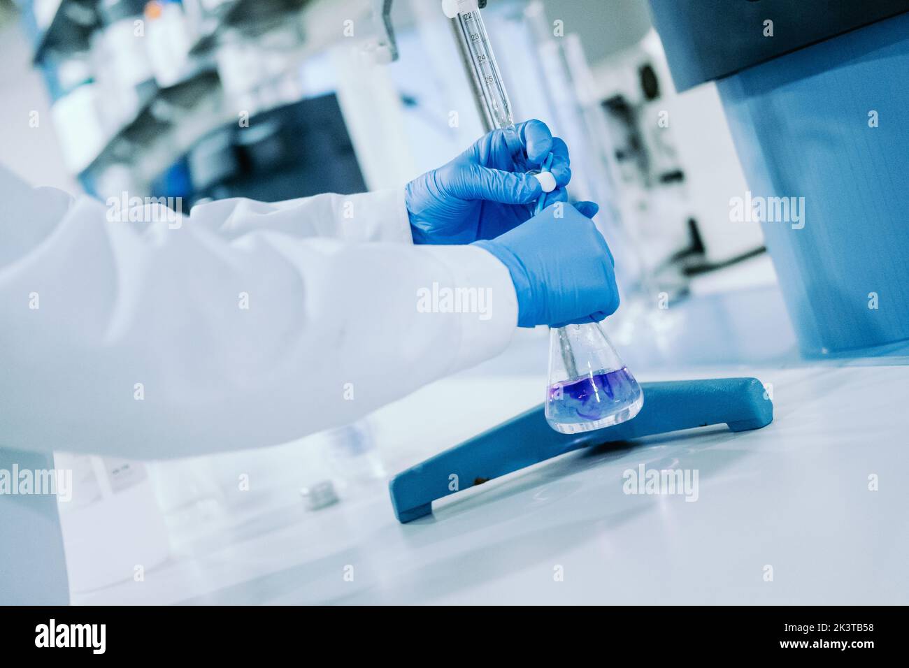 Medical worker putting test tube hi-res stock photography and images ...