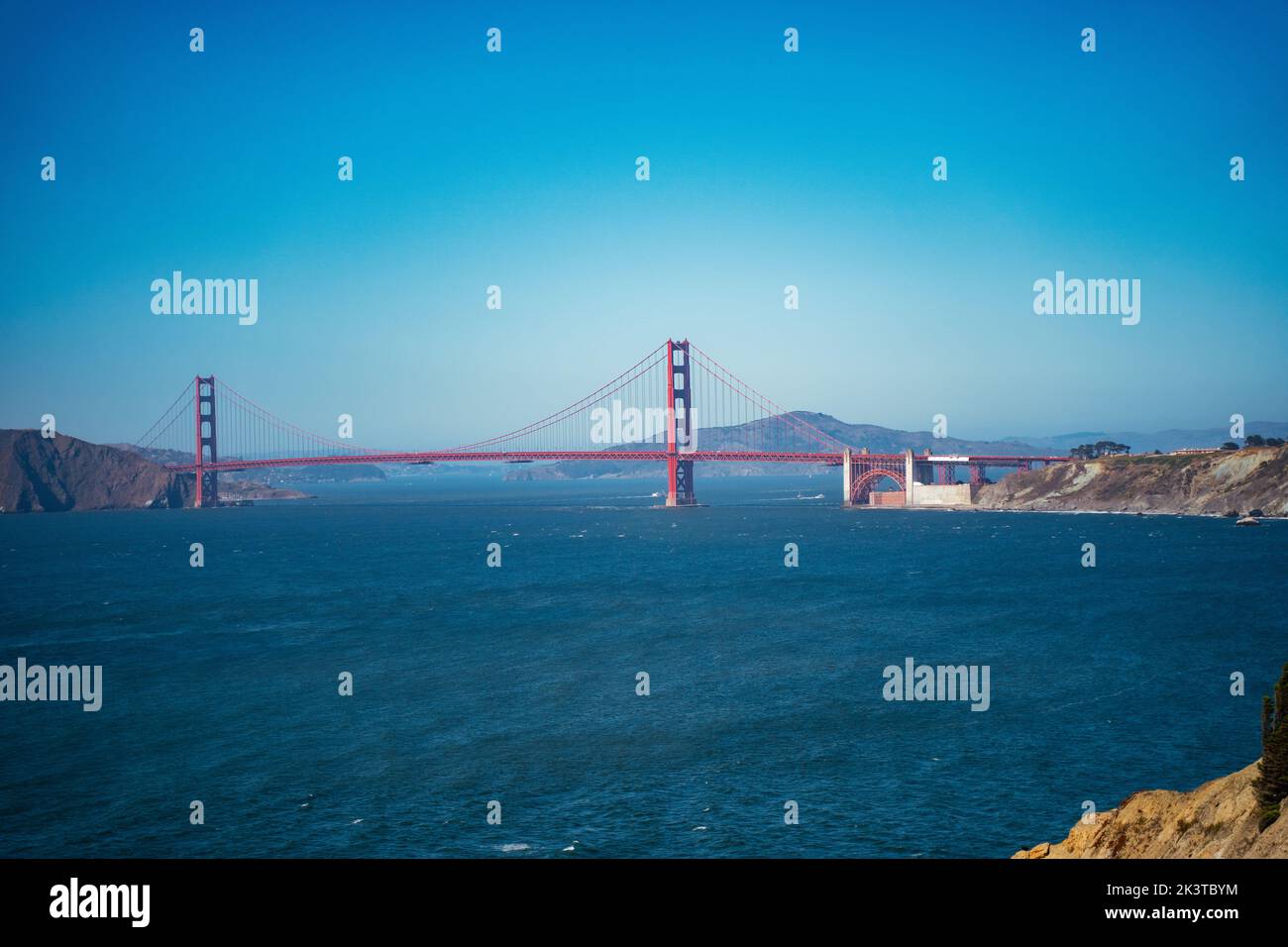 Golden gate bridge from lands end trail deadman's point on a bright ...