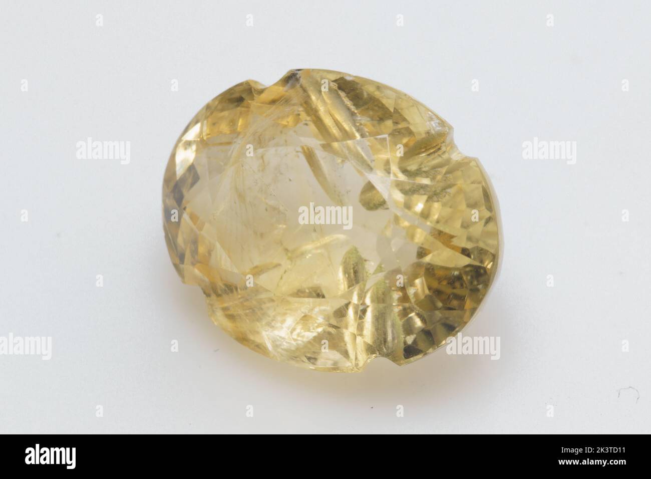 Natural gemstone yellow citrine on a white background Stock Photo - Alamy