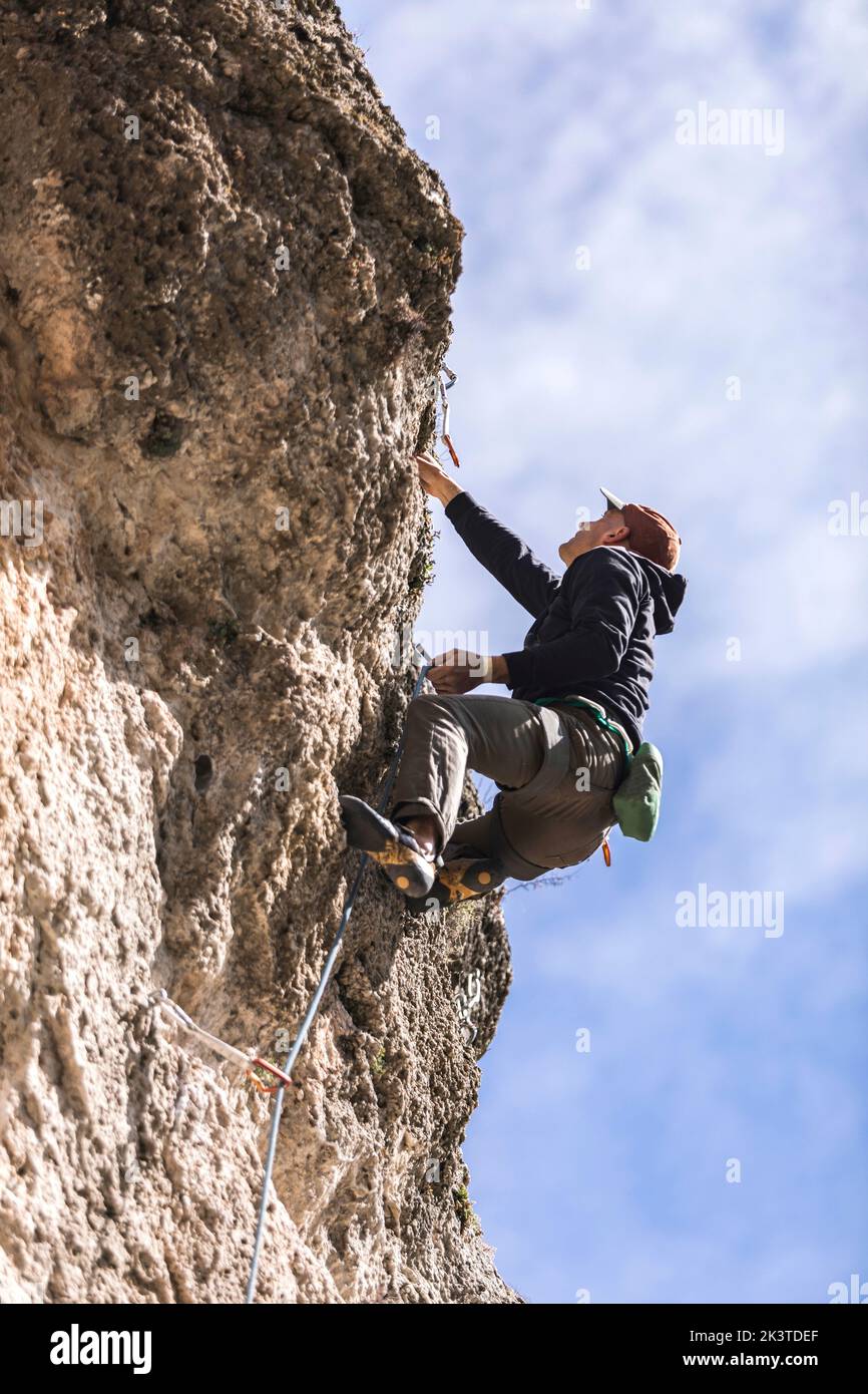 Hanging cliff hand hi-res stock photography and images - Alamy