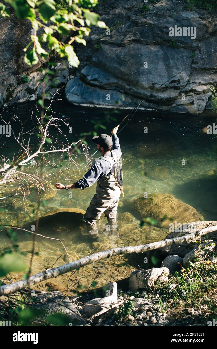 Throwing fishing rod hi-res stock photography and images - Alamy