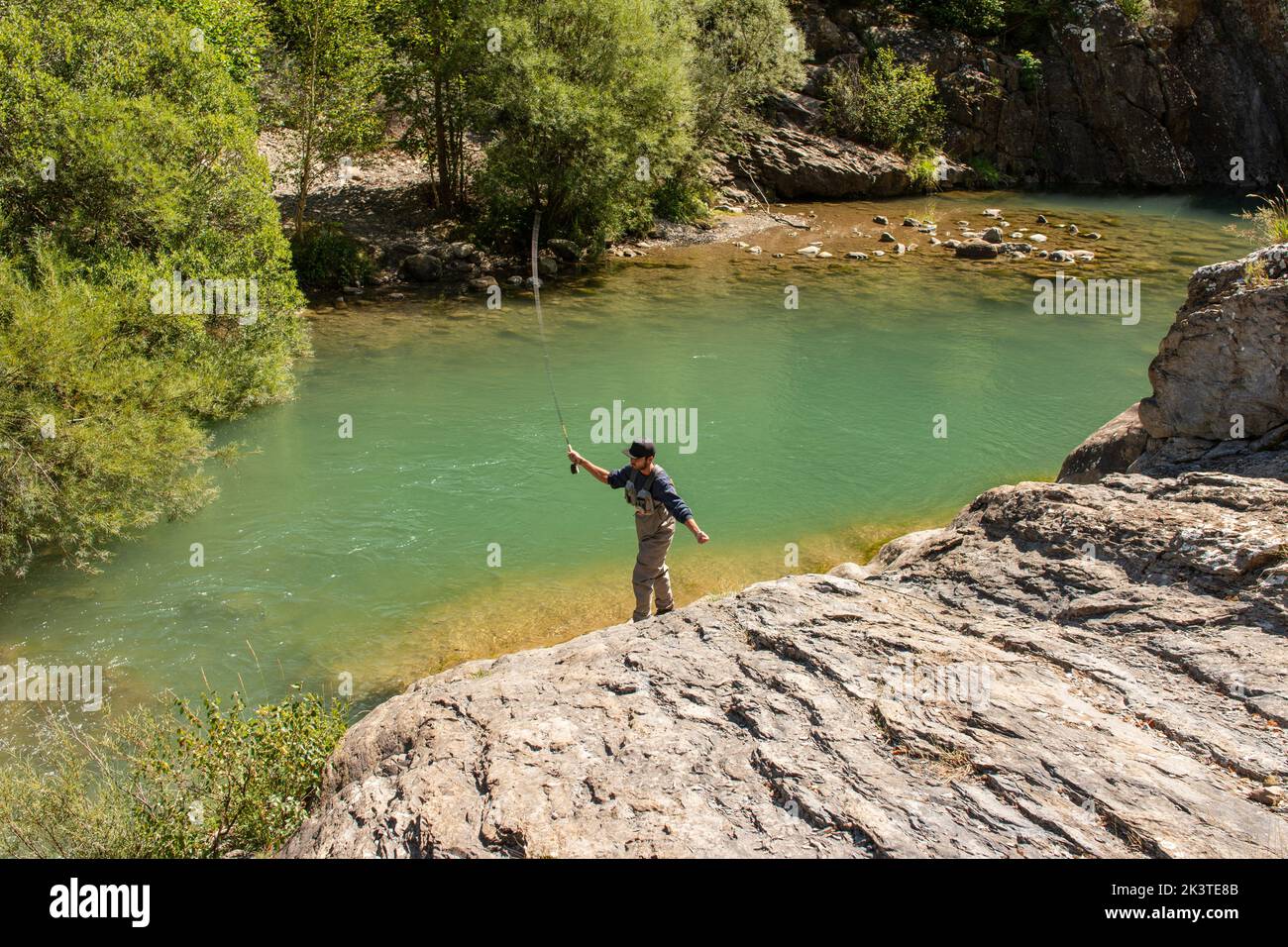 Throwing fishing rod hi-res stock photography and images - Alamy