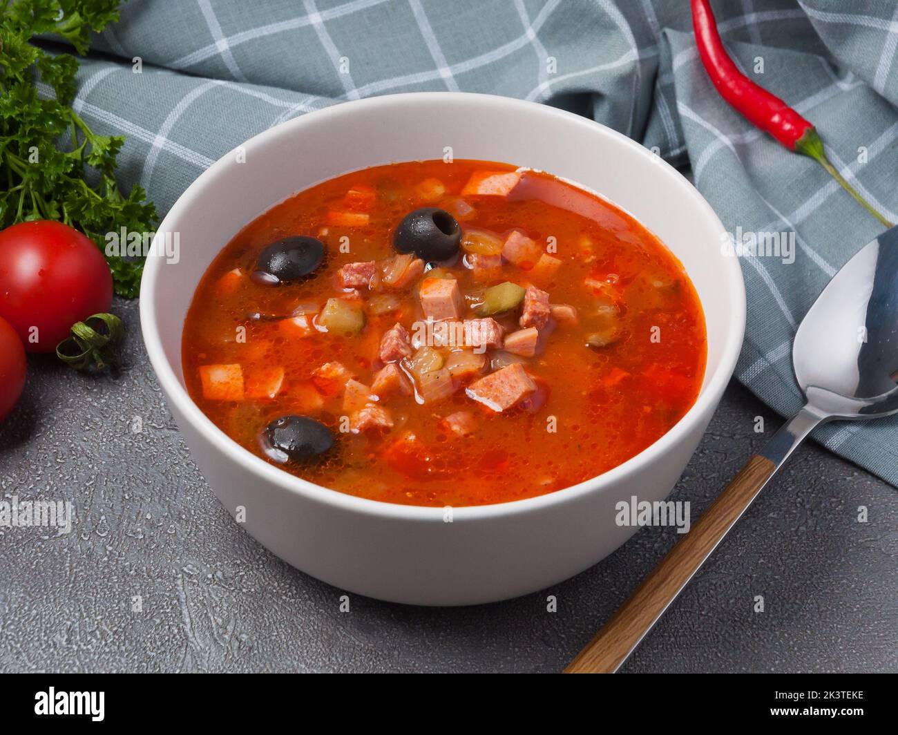 solyanka is a tasty Russian soup with assorted meat and sausages Stock ...