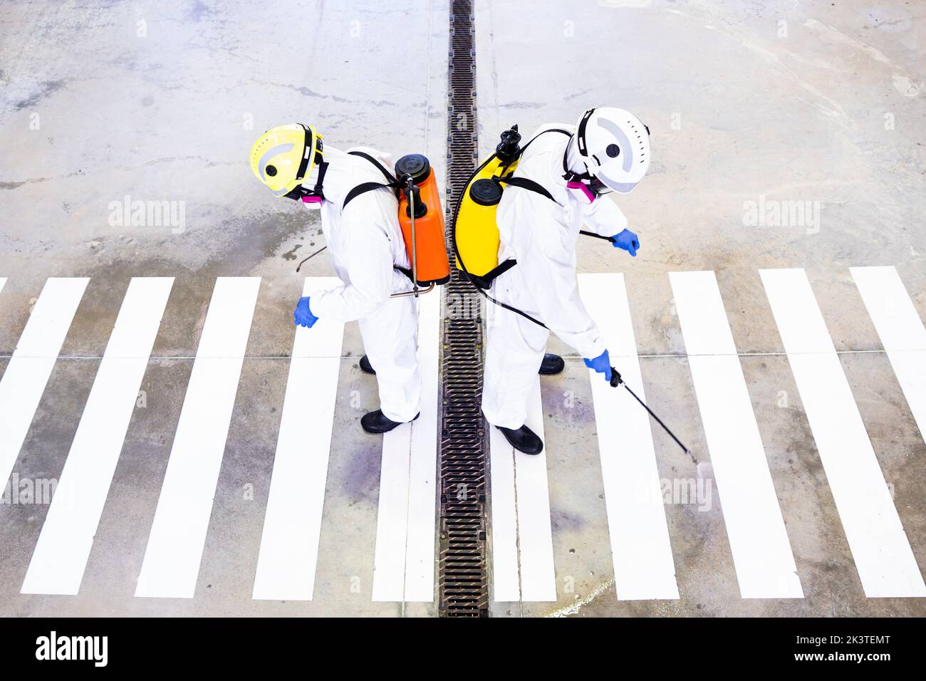 Two firefighters disinfecting the interior of a building Stock Photo ...