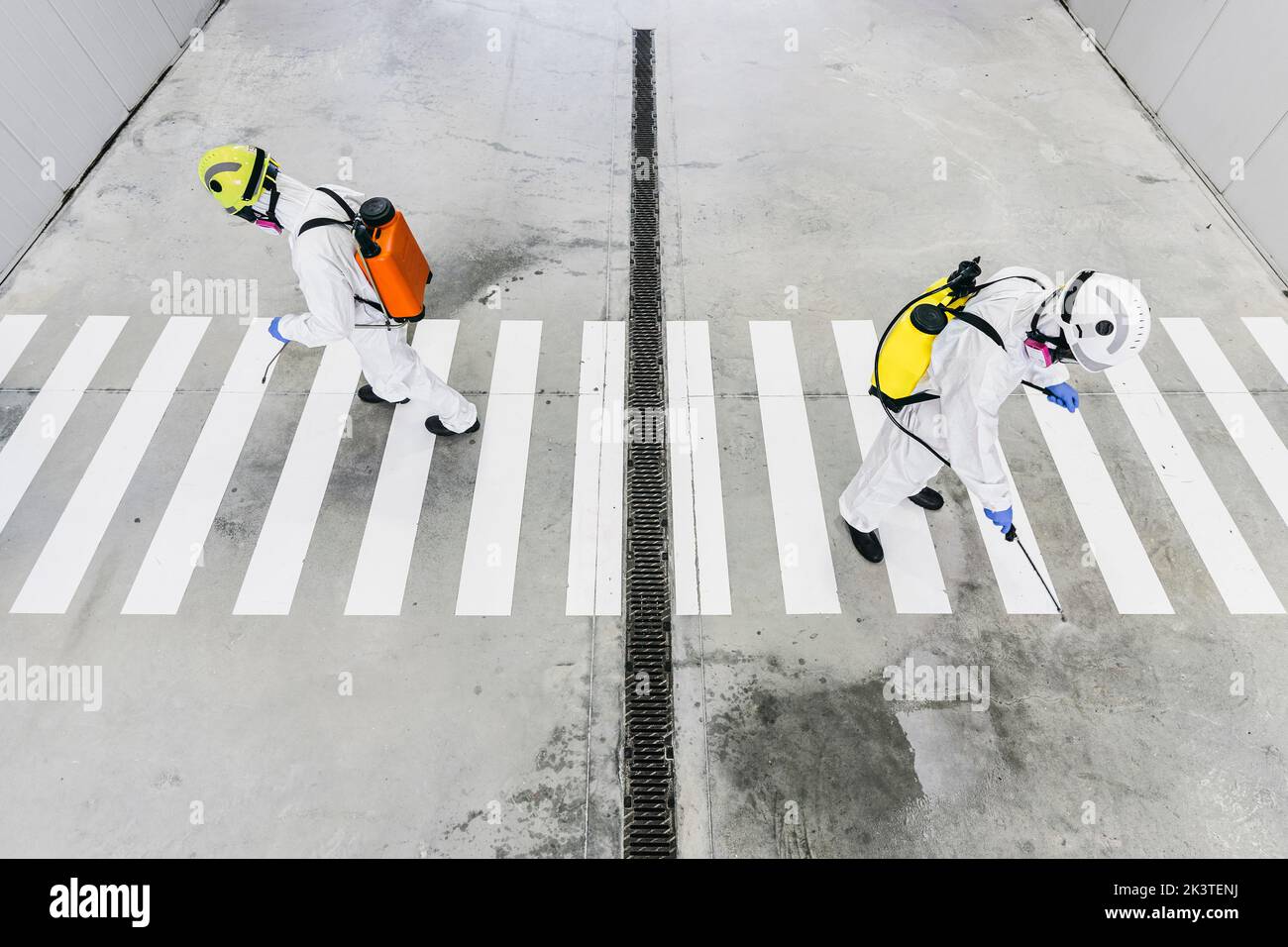 Two firefighters disinfecting the interior of a building Stock Photo ...