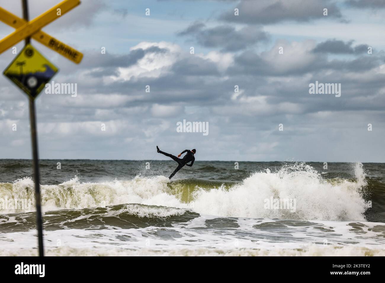 Westerland, Germany. 28th Sep, 2022. A surfer falls during a session on ...