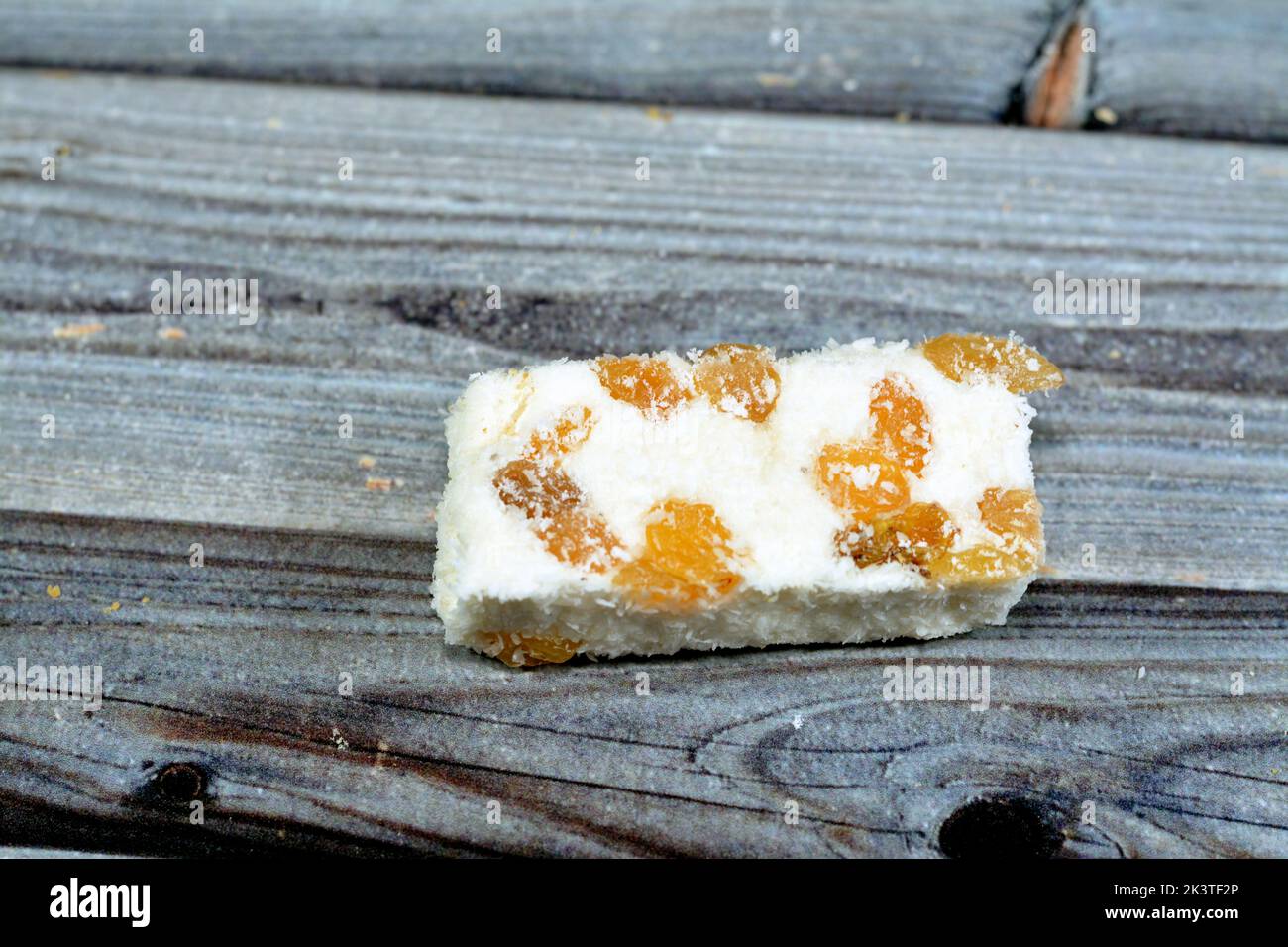 creamy taffy with raisins and coconut, an Eastern candy made as a ...